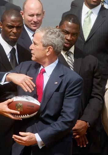 george bush with football vs black men « MyConfinedSpace