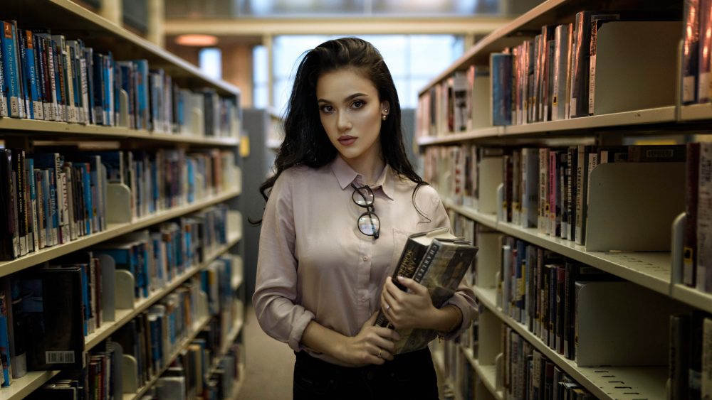 women with books in library dp - MyConfinedSpace