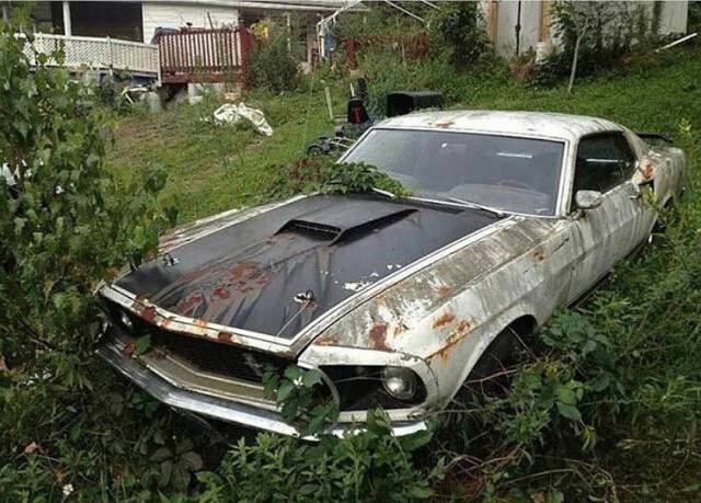 rusted out sports car - MyConfinedSpace