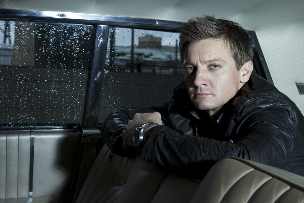 Jeremy Renner in a rain soaked car - MyConfinedSpace