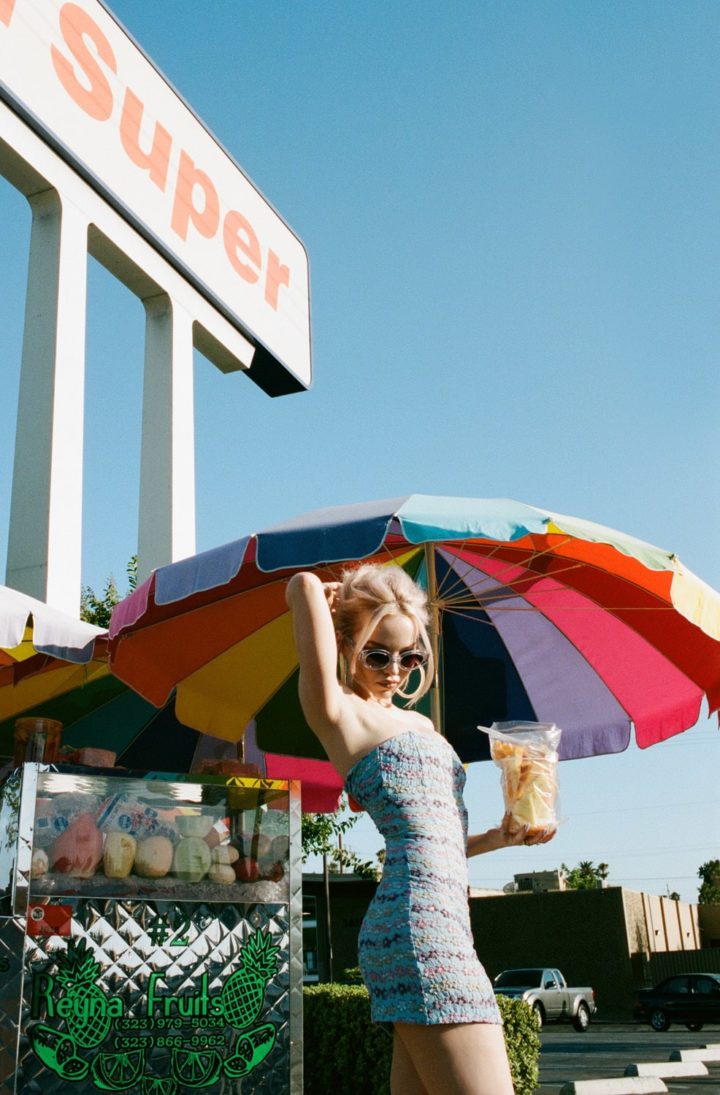 Dove Cameron stretching in the sun - MyConfinedSpace