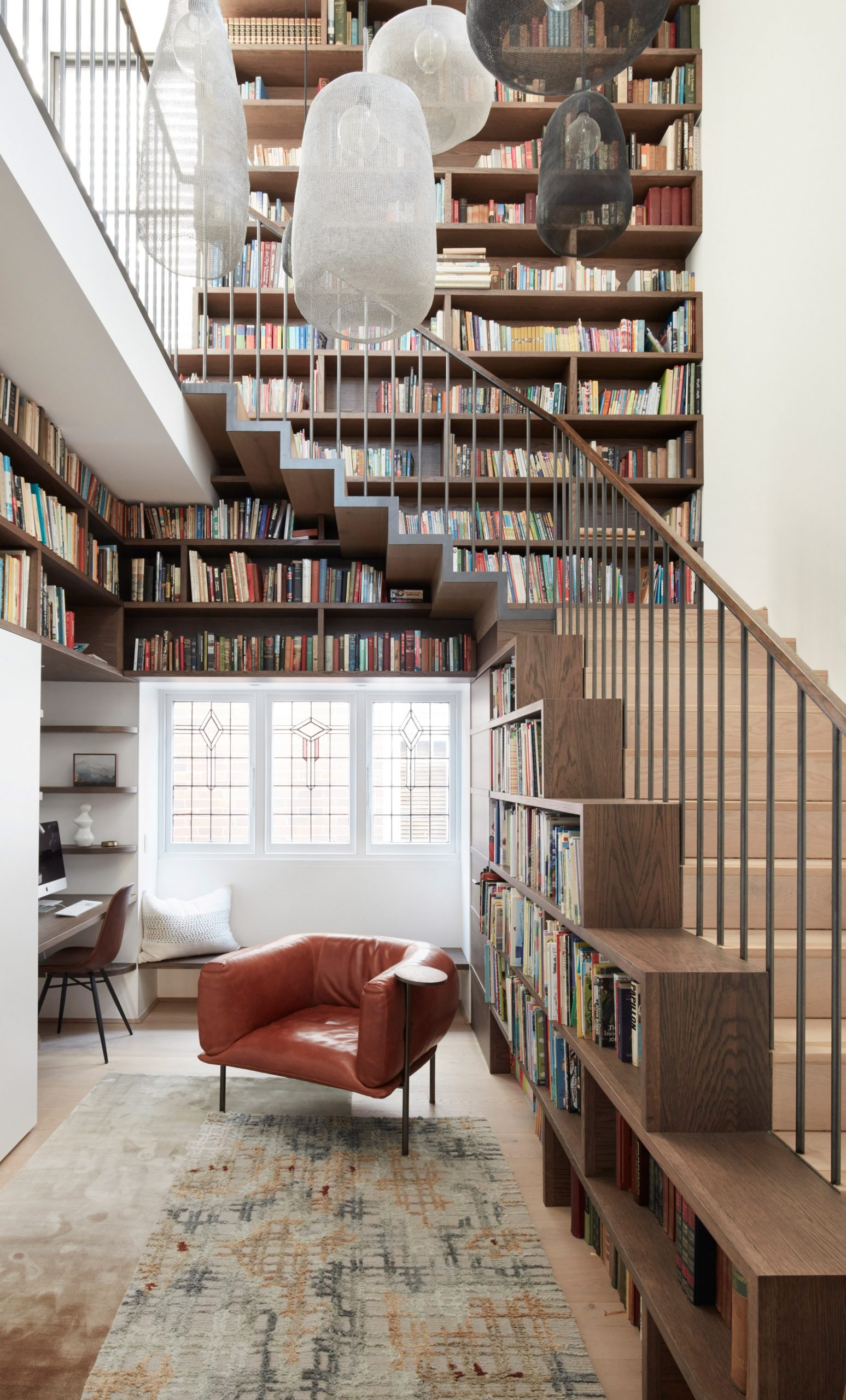 Study area in a stairwell surrounded with bookcases Bondi Beach ...