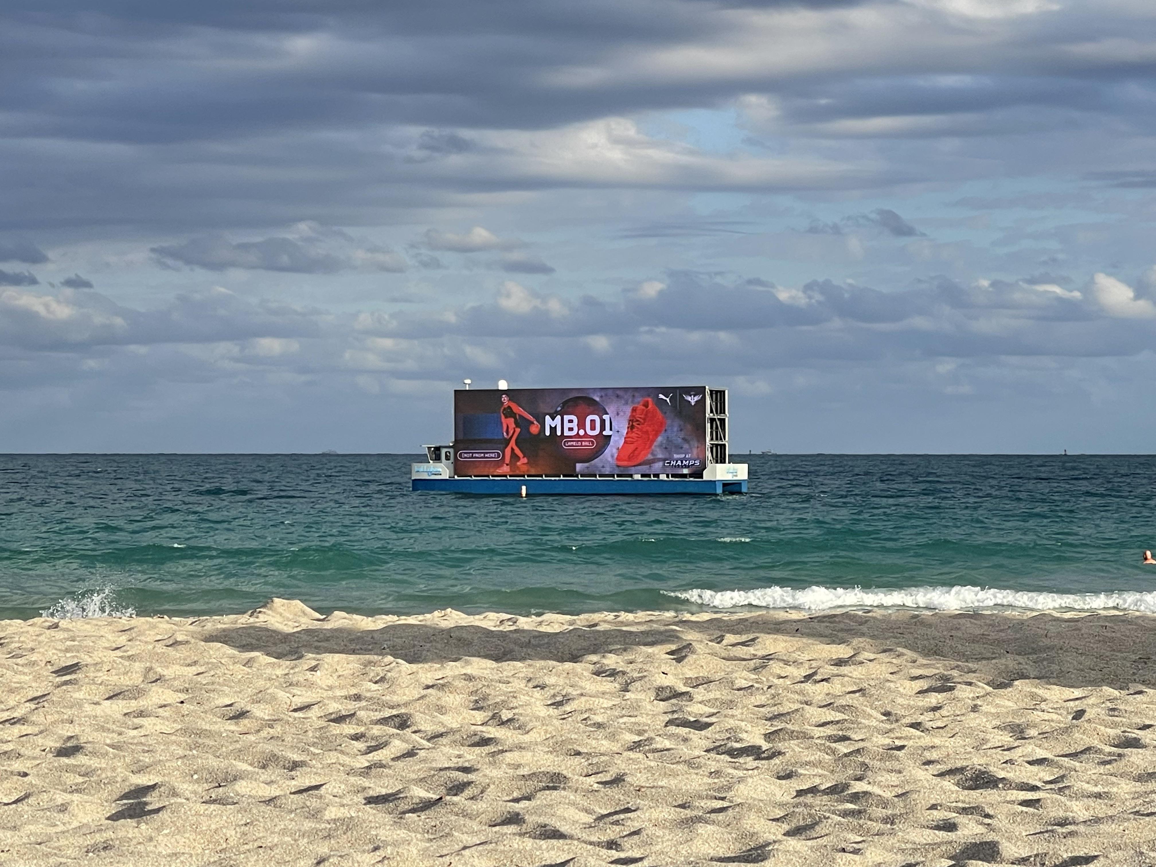 floating billboard on Miami Beach - MyConfinedSpace