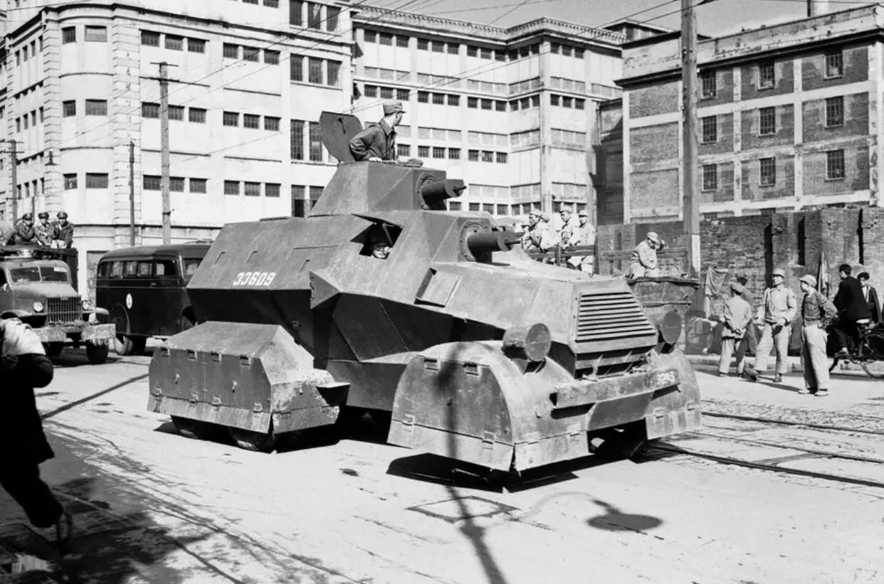A Chinese Nationalist armored vehicle rolling through the streets of ...
