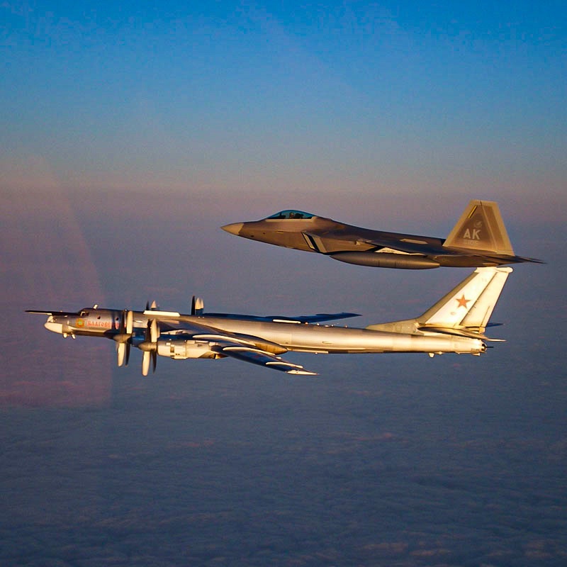 A 3rd Fighter Wing F-22 Raptor intercepting a Tu-95 Bear near Nunivak ...