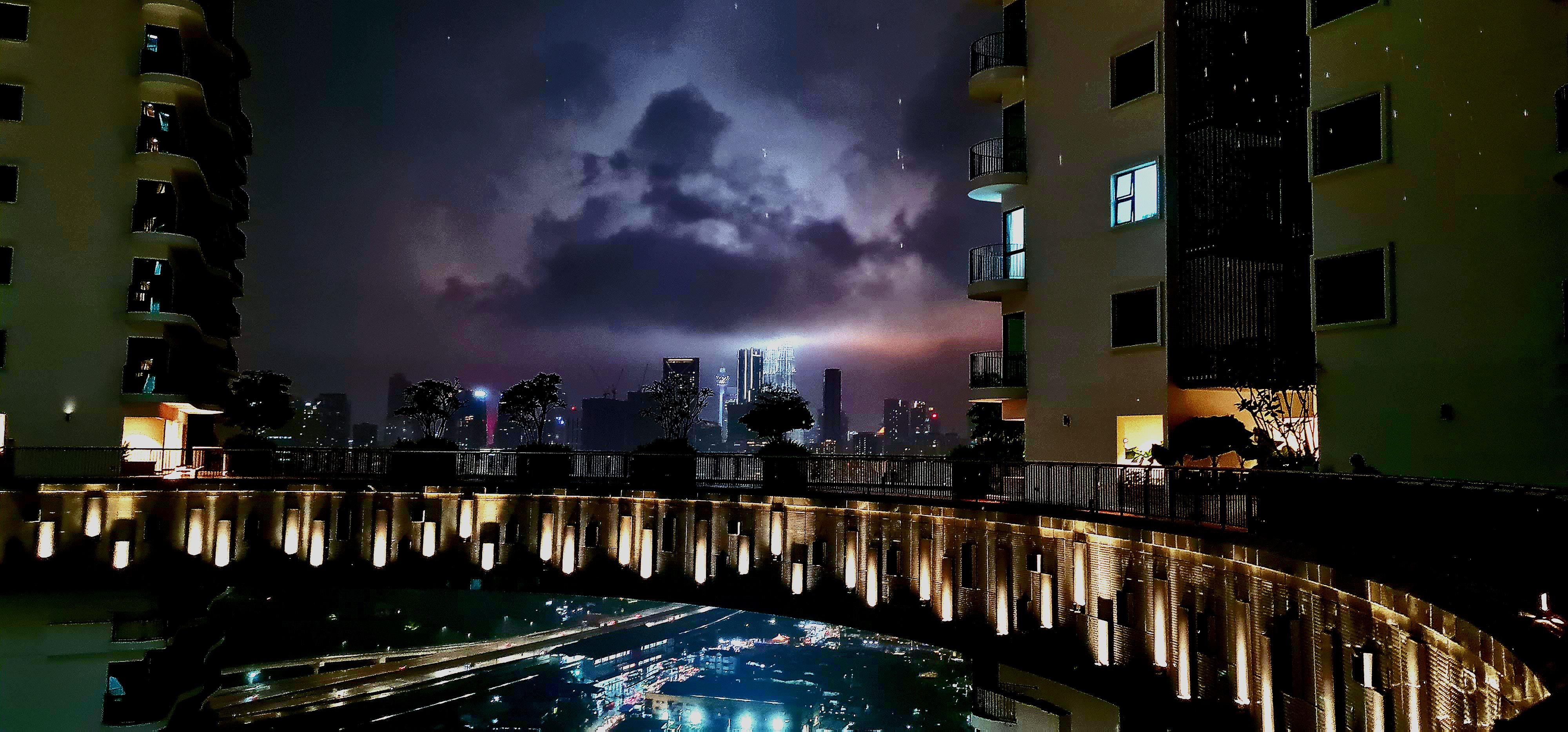 Kuala Lumpur skyline from Datum Brigde on a wet monsoon night ...