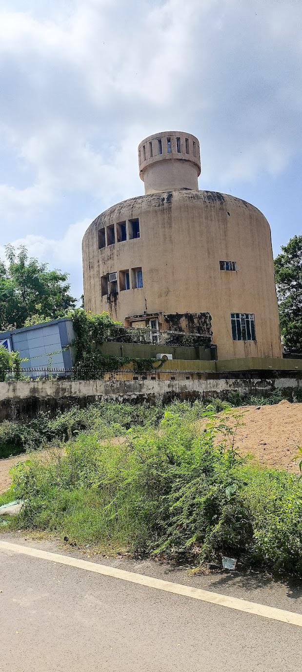 this bottle shaped office building - MyConfinedSpace