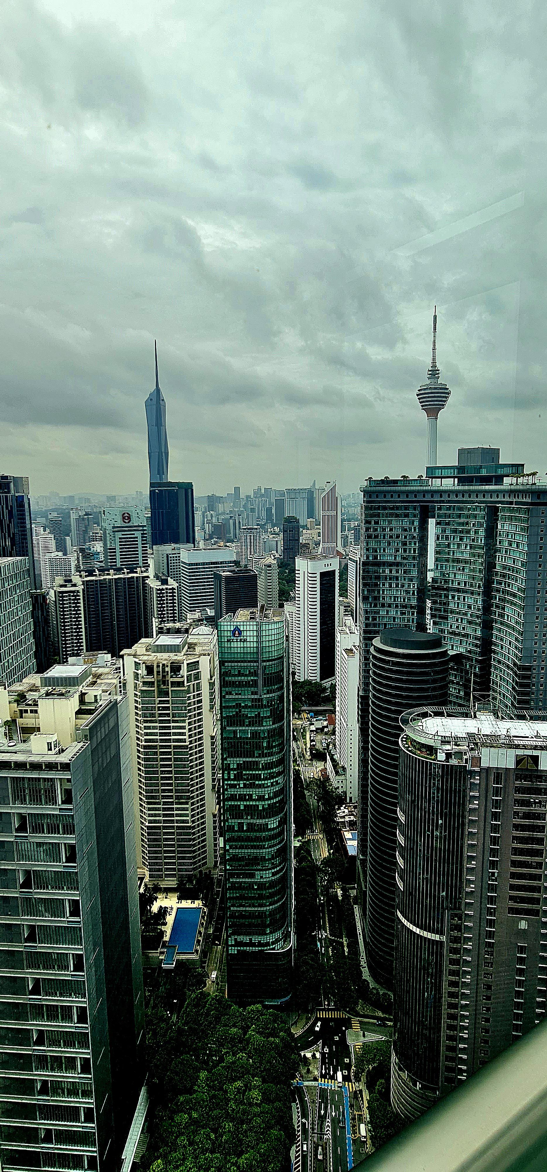 Merdeka Tower and KL Telecom Tower viewed from Petronas Twin Towers ...