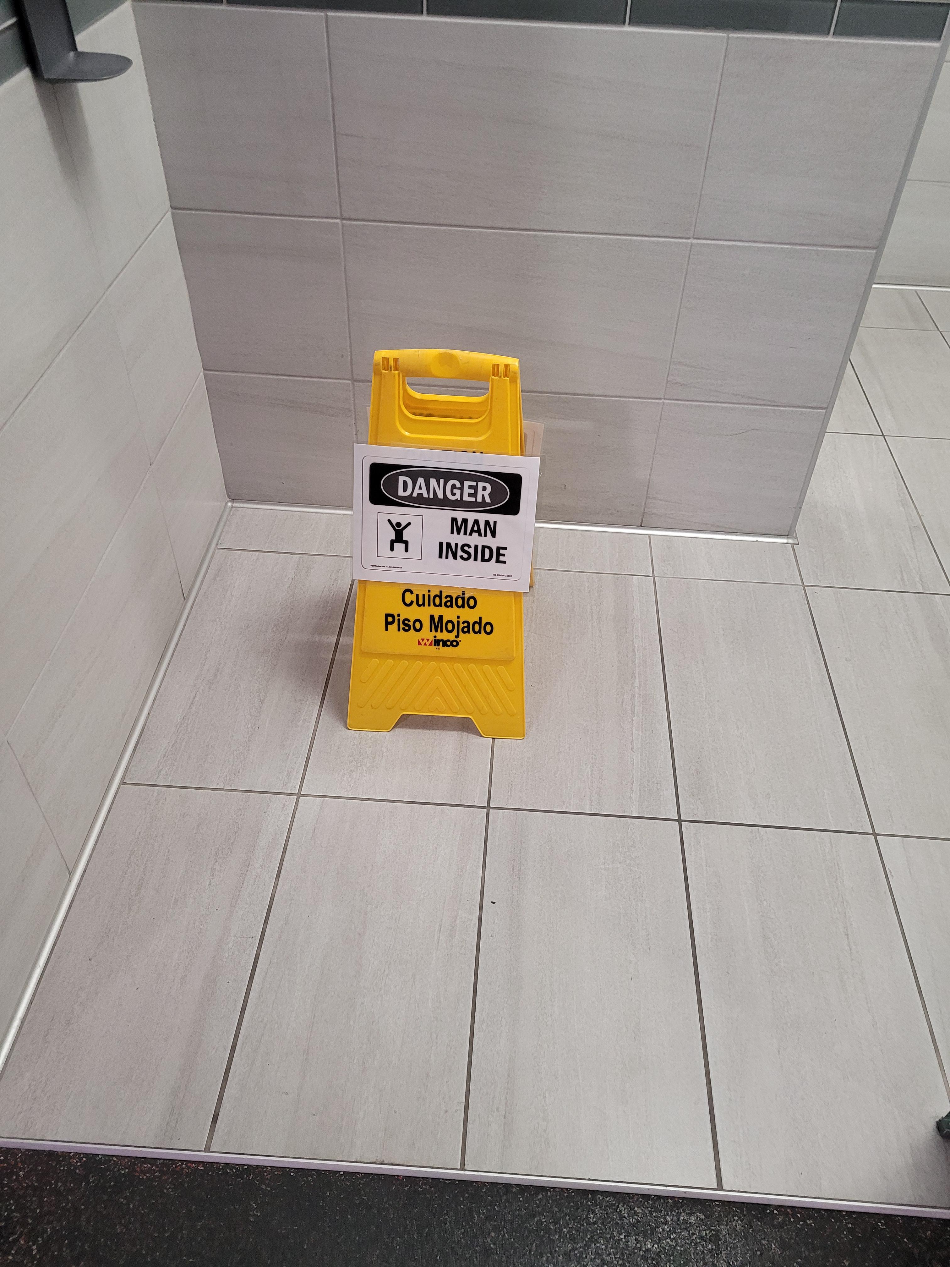 This is the sign my gym puts up when the janitors are cleaning the ...