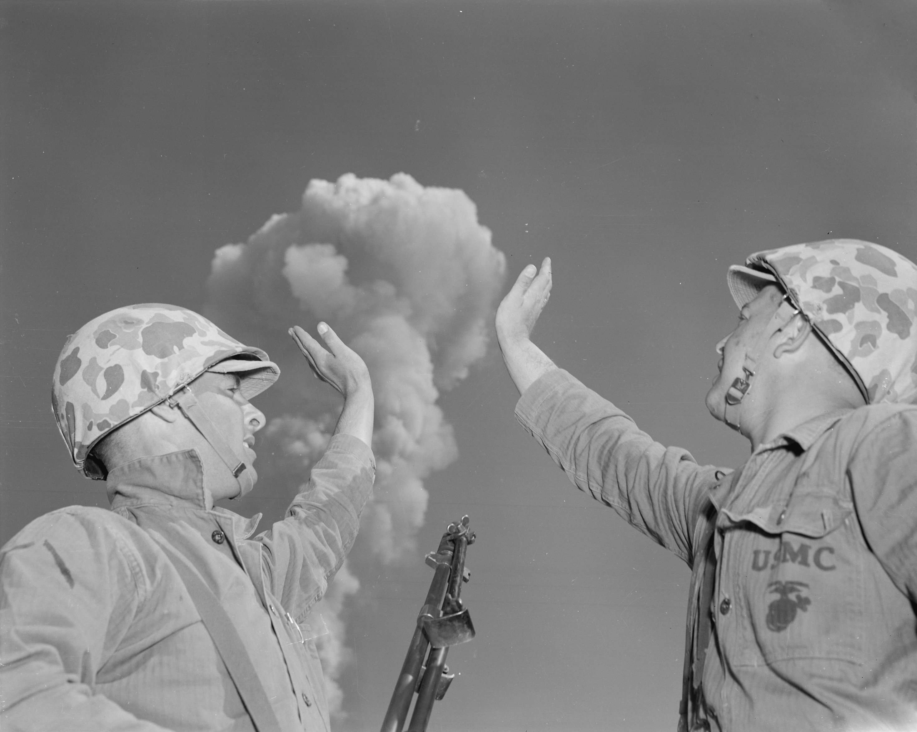 soldiers high five a nuke - MyConfinedSpace