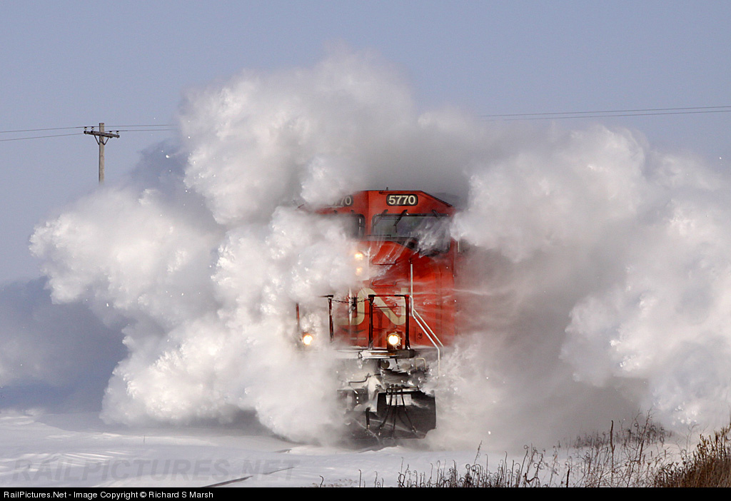 Train plowing snow - MyConfinedSpace